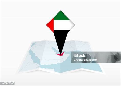 아랍 에미리트 연합국은 접힌 종이지도와 아랍 에미리트 국기와 함께 고정 된 위치 마커에 묘사되어 있습니다 0명에 대한 스톡 벡터 아트 및 기타 이미지 Istock