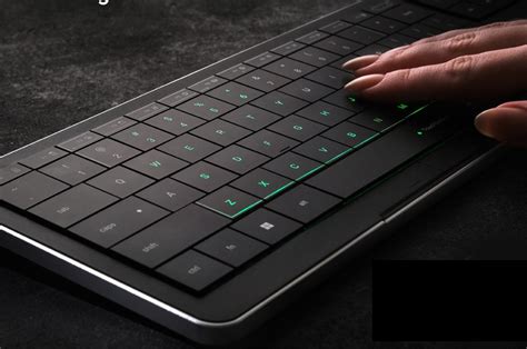 Innovative Bluetooth keyboard turns its surface into a giant touchpad ...