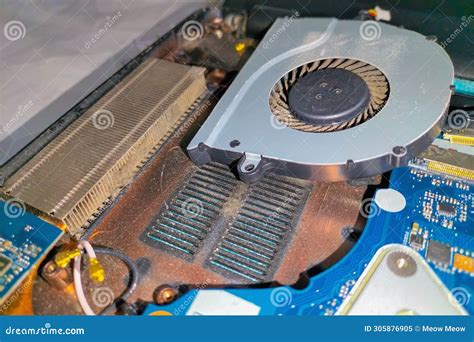 Laptop Cpu Cooling Fan With Clogged Guide Vanes In The Process Of Work
