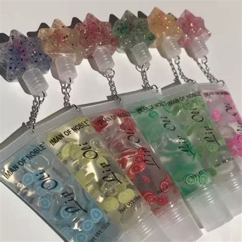 خرید و قیمت بالم لب فانتزی کیوت برق لب حرارتی جذاب رنگهای شاد جذاب