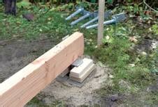 Installing And Leveling Your Deck Using Pre Fab Footings And Fixing The Joists