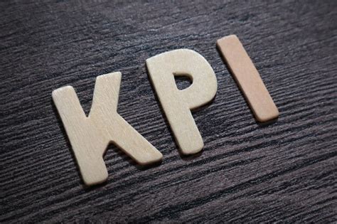 Premium Photo Kpi Key Performance Indicator Text Written With Wooden Letter On Black