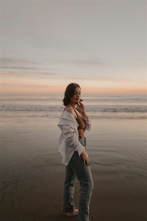 Woman Poses On The Beach At Sunset Photo Free Beach Image On Unsplash