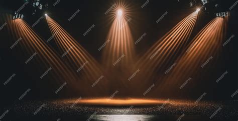 Premium Photo Stage With Yellow Or Gold Spotlights Pointing To The