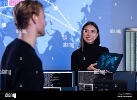 Smiling Cyber Security Team Working In A Cyber Security Operations