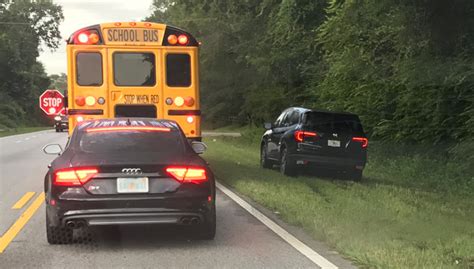 Driver Caught On Camera Passing School Bus On Shoulder