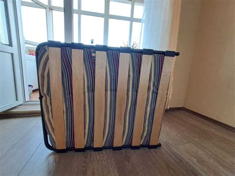 Розкладачка на ламелях з матрацом та металевим каркасом 2 000 грн Меблі для спальні