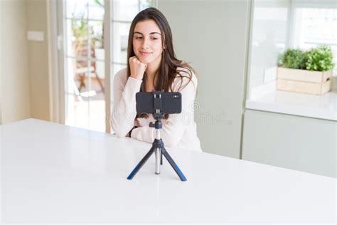 Beautiful Young Woman Recording Selfie Video With Smartphone Webcam