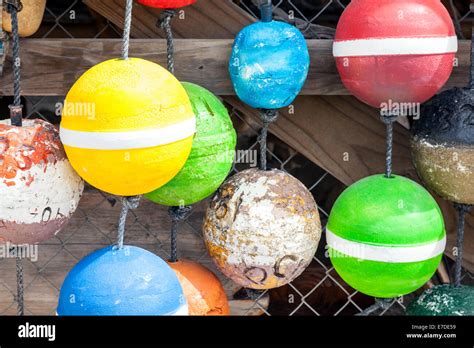 Colorful Styrofoam Fishing Net And Crab Lobster Trap Floats Hanging On Colorful Styrofoam Fishing Net And Crab Lobster Trap Floats Hanging On