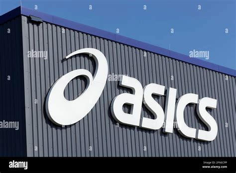 Logo Asics at the German headquarters, Japanese sports shoe and ...