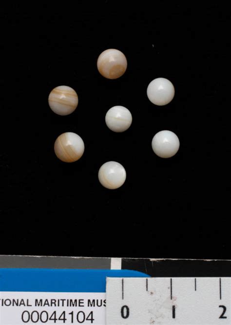 Seven Small Spherical Nuclei White With Light Brown Stripes Works