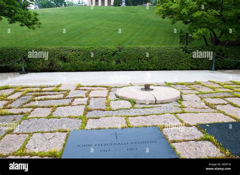 John F Kennedys Grave And The Eternal Flame At Arlington National