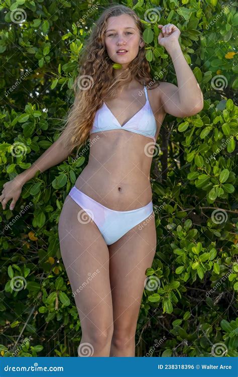 Lovely Blonde Bikini Model Posing Outdoors On A Caribbean Beach Stock Photo Image Of America