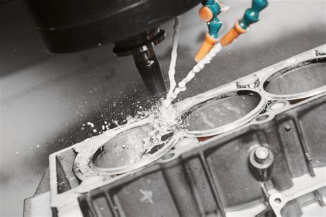 High Precision Cnc Milling Machine Makes Holes In The Car Engine Stock