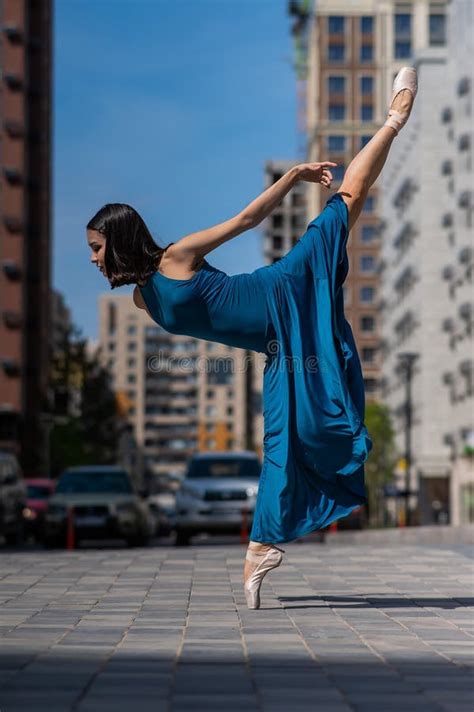 Beautiful Asian Ballerina Dancing Outdoors Urban Landscape Stock