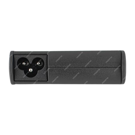 Premium Photo Laptop Power Adapter With A Threepin Socket On A White Background