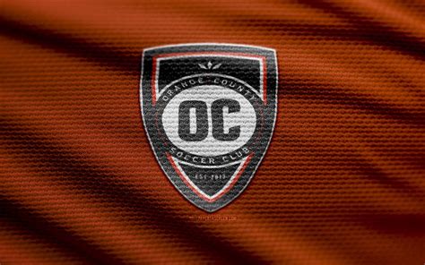 다운로드 오렌지 카운티 Sc 패브릭 로고 4k 오렌지 직물 배경 Usl 챔피언십 보케 축구 오렌지 카운티 Sc 로고 Usl 오렌지 카운티 Sc 엠블럼 오렌지