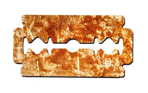 Premium Photo Corrosive Rust On The Razor Blade Isolated On White