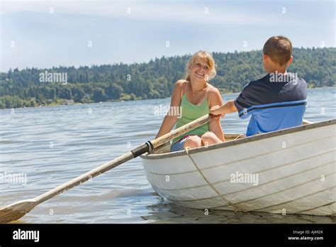 Babe And Girl In Row Boat Stock Photo Alamy