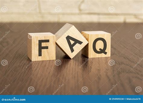 Frequency Asked Questions Concept With Symbols Faq On Wooden Cubes Dark Wooden Background Stock