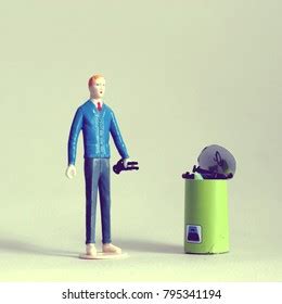 Man Throws Another Tiny Man Trash Stock Photo 795341194 Shutterstock