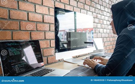 Computer Hacker Or Cyber Attack Concept Dangerous Hooded Hacker Using