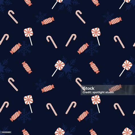 롤리팝 사탕 눈송이 매끄러운 패턴 배경이 있는 진한 파란색 Bg에 빨간색과 흰색 색상의 사탕 지팡이 겨울 휴가 직물 선물 포장
