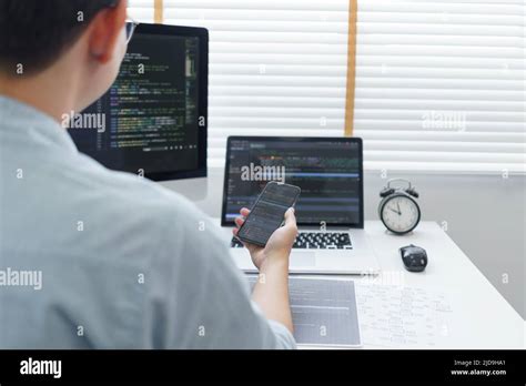 software development concept male programmer check website programming