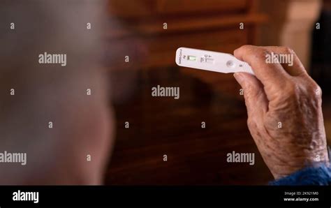 Close Up Of Caucasian Grandma Hand Holding A Buffer Dropper For Seft
