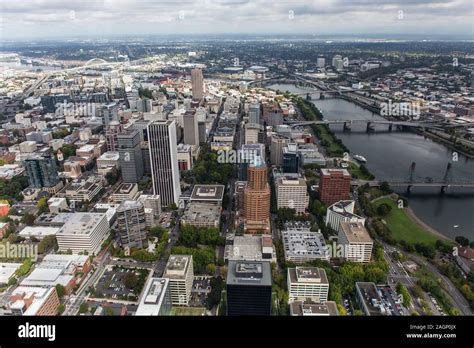 Aerial View Of Buildings Bridges Towers Streets And The Williamette River In Downtown