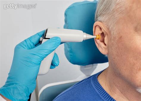 Portrait Of Mature Man While Tympanometry And Test Of Middle Ear Function With Ent Doctor Using