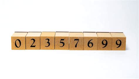 Wooden Blocks Displaying Numbers In A Row Isolated On White Concept For Education Counting