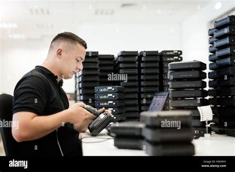 Worker Using Barcode Reader To Identify Product Stock Photo Alamy