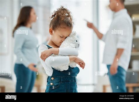 Are Mom And Dad Going To Get Divorced A Young Girl Looking Sad While