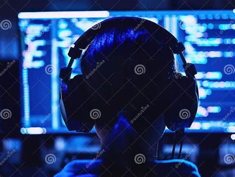 Programmer Wearing Headphones Coding On Computer At Night Stock Image Image Of Code Engineer