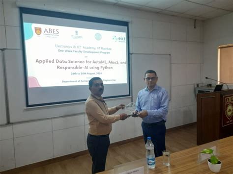 Giving A Memento To Keynote Speaker Prof Munesh C Trivedi During