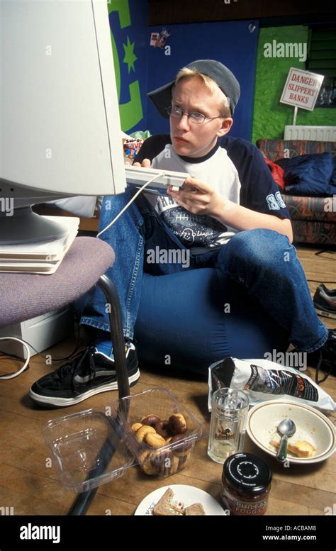 Teenage Babe Computer Nerd Playing On His Computer Stock Photo Alamy