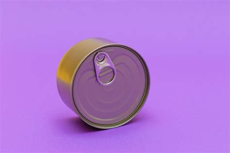 Premium Photo Unopened Tin Can With Blank Edge On Violet Background