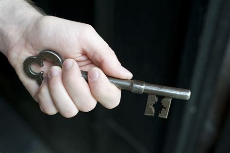 Hand Holding A Metallic Vintage Key Stockarch Free Stock Photo Archive