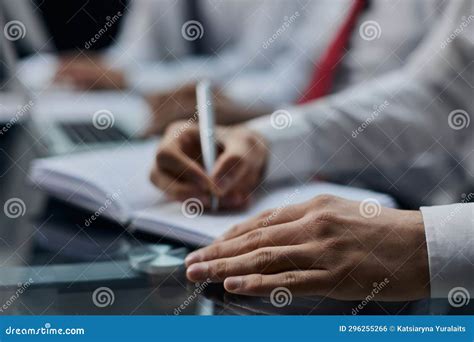 Businessman Hand Writing Note On A Notebook Close Up Business Man
