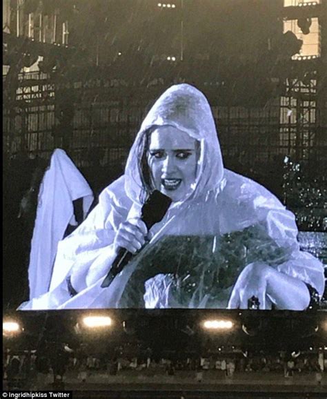 Adele Covers Her Glam Gown With A Fans Pink Waterproof Ball Gowns