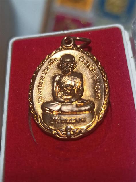 หลวงพ่อรวยรุ่นชนะจน Ennxo