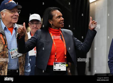 Denver Broncos Owner Condoleezza Rice Gestures Before An Nfl Football