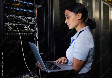 Foto De Engineer Laptop Database And Woman In Server Room For Software Update Or Maintenance At