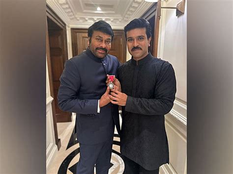 Proud Son Ram Charan Strikes Pose With Father Chiranjeevis Padma