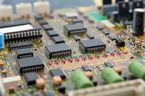 Close Up Of Electronic Circuit Board Pcb With Microchip Integrated Circuits Resistances And