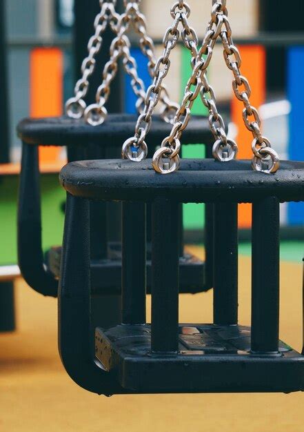 Premium Photo Swing In The Playground