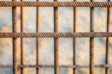 Close Up View Of Rusty Rebar Grid Metal Reinforcement Structure For Concrete Foundation