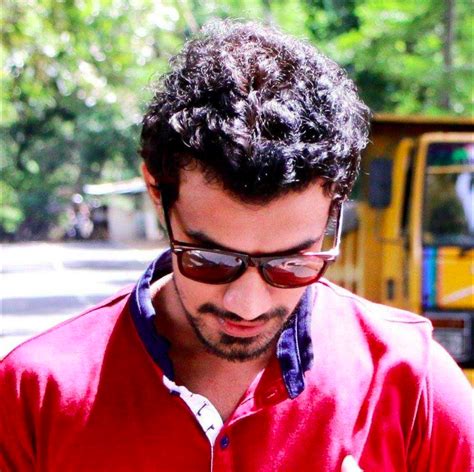 Milan Dikkumburage Medium