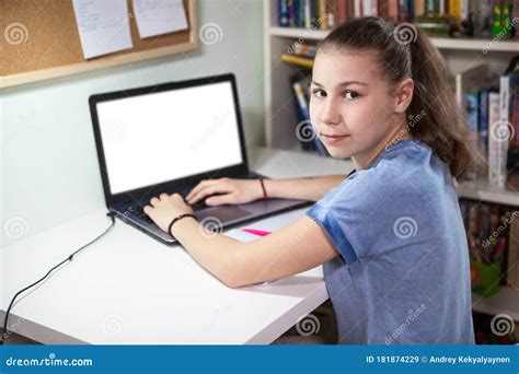 Pre Teen Girl Learning Online Distance Education Of Pupil With Laptop